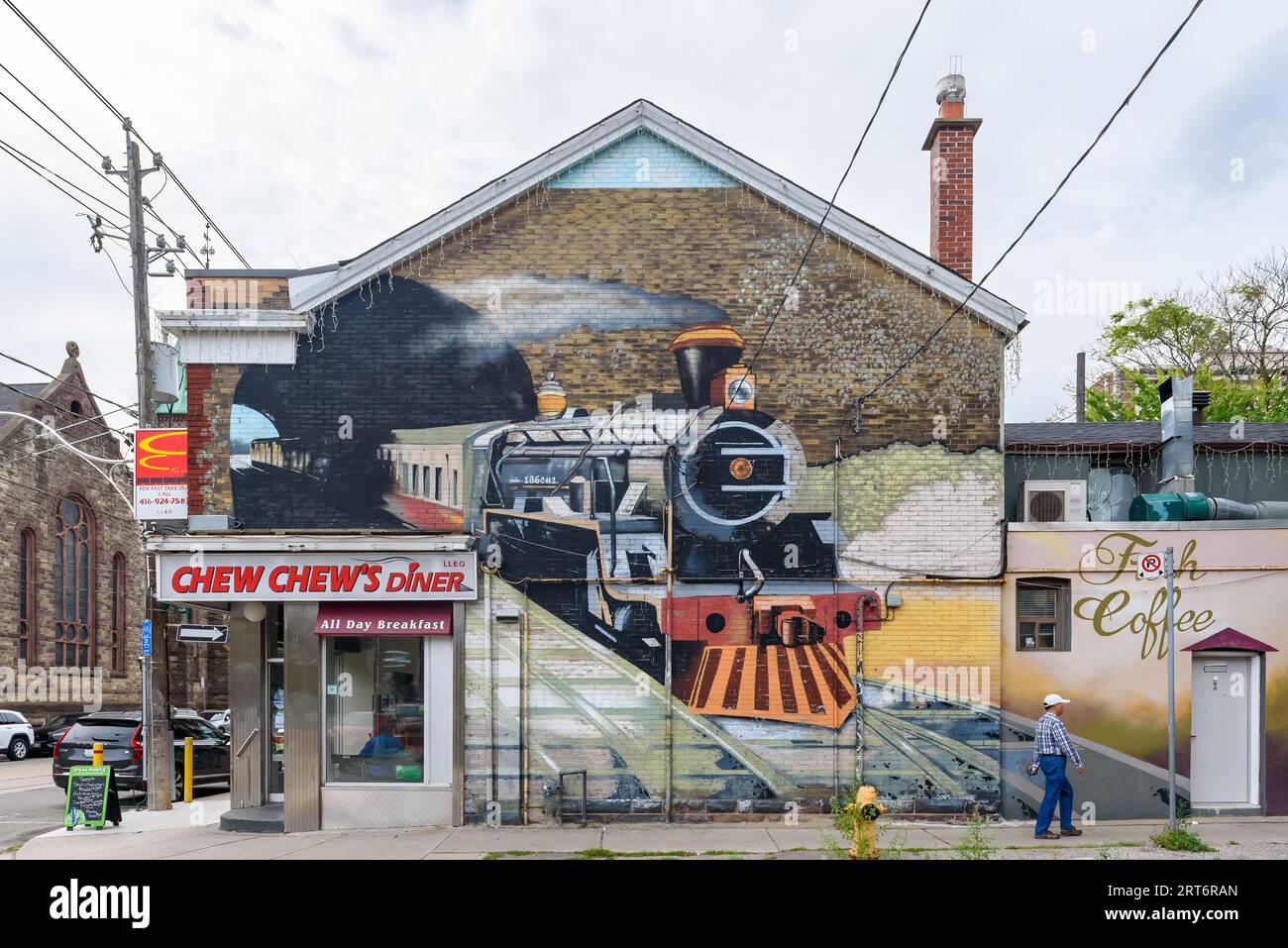 Toronto, Canada, an urban art painting of a steam locomotive in the ...