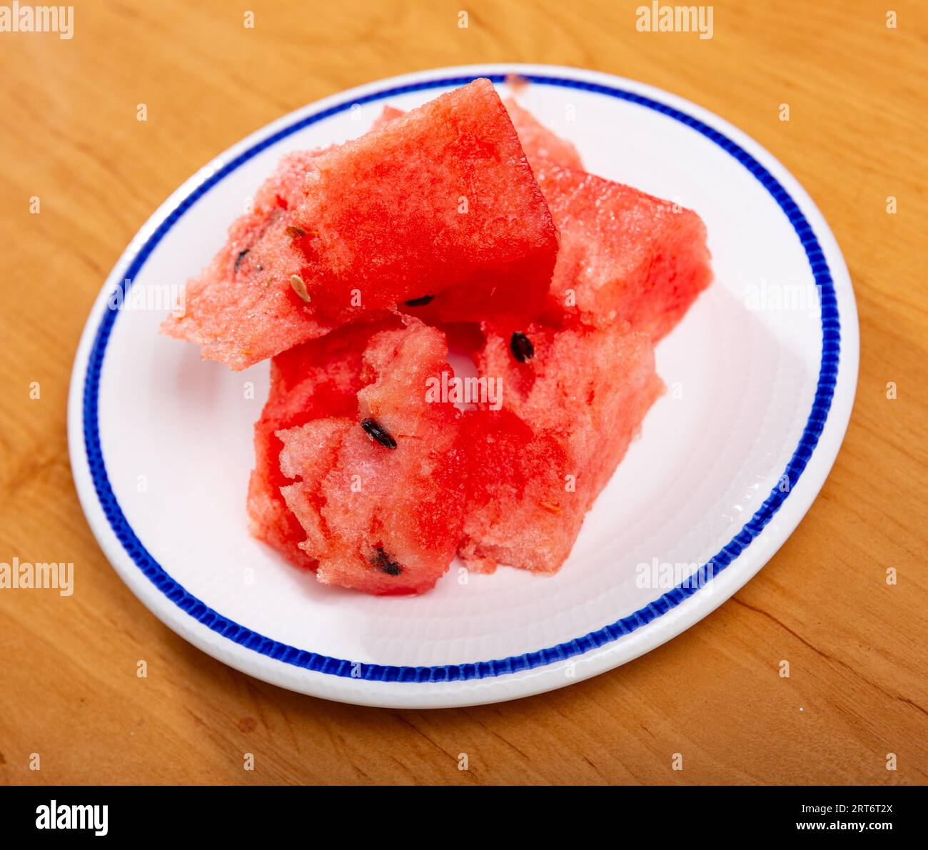 Pieces of watermelon served in a plate Stock Photo - Alamy