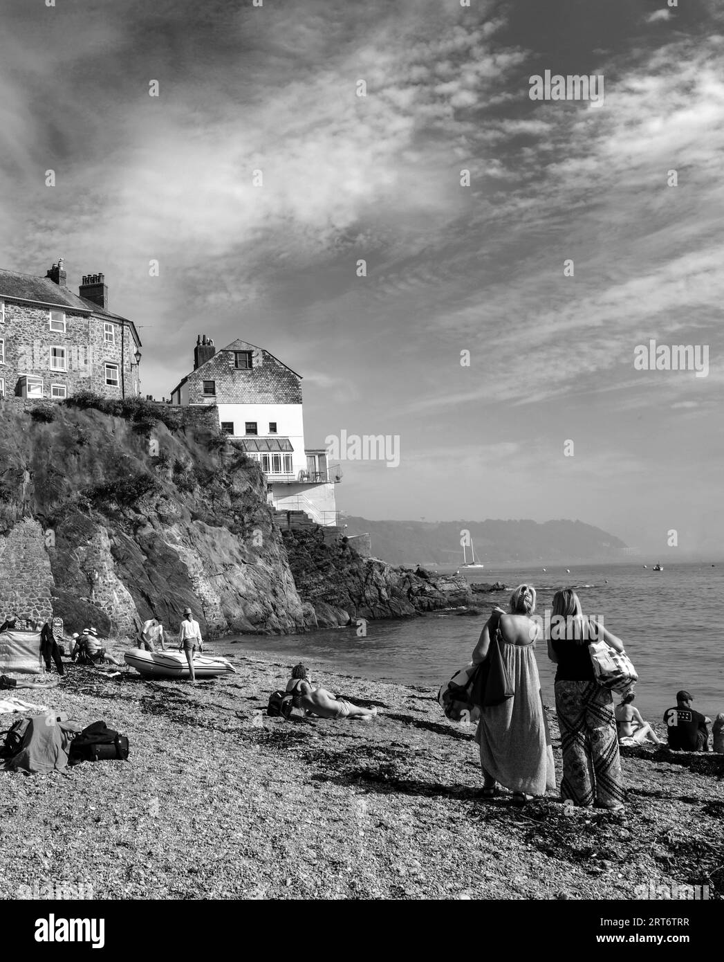 Black and white image of Cawsand Beach, Cornwall on a hot September ...