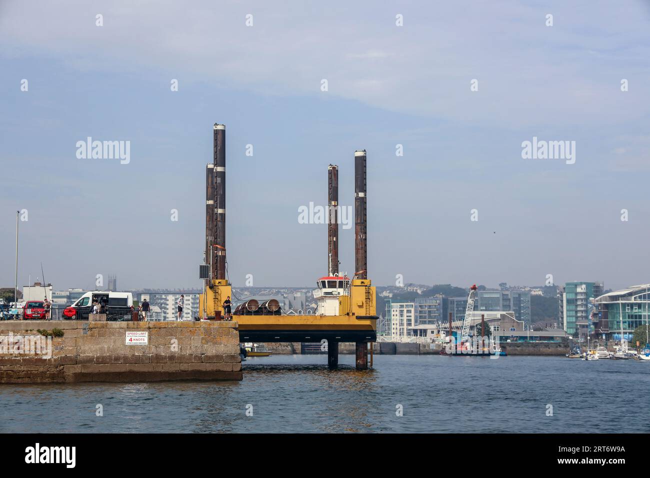 Jacklad 650 a bright yellow barge, nautical platform, berthed in the ...