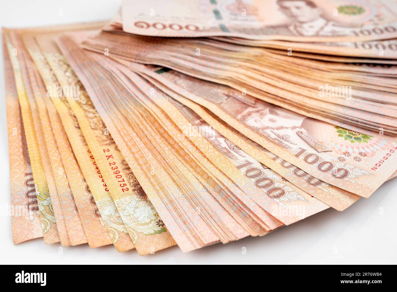 Heap of Thai 1,000 baht banknotes issued by the Bank Of Thailand Stock ...