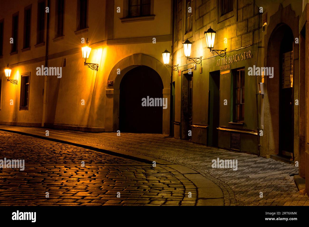 Old Town Square Romanesque stye portals and checkered cobblestone ...