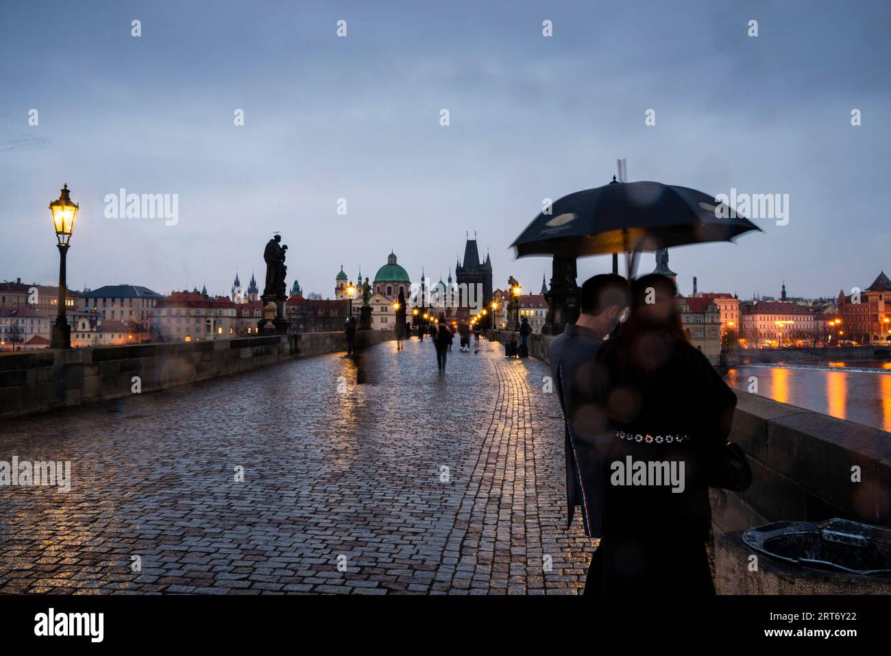 Moody medieval Charles Bridge and Old Town Bridge Tower in Prague, Czech Republic Stock Photo ...