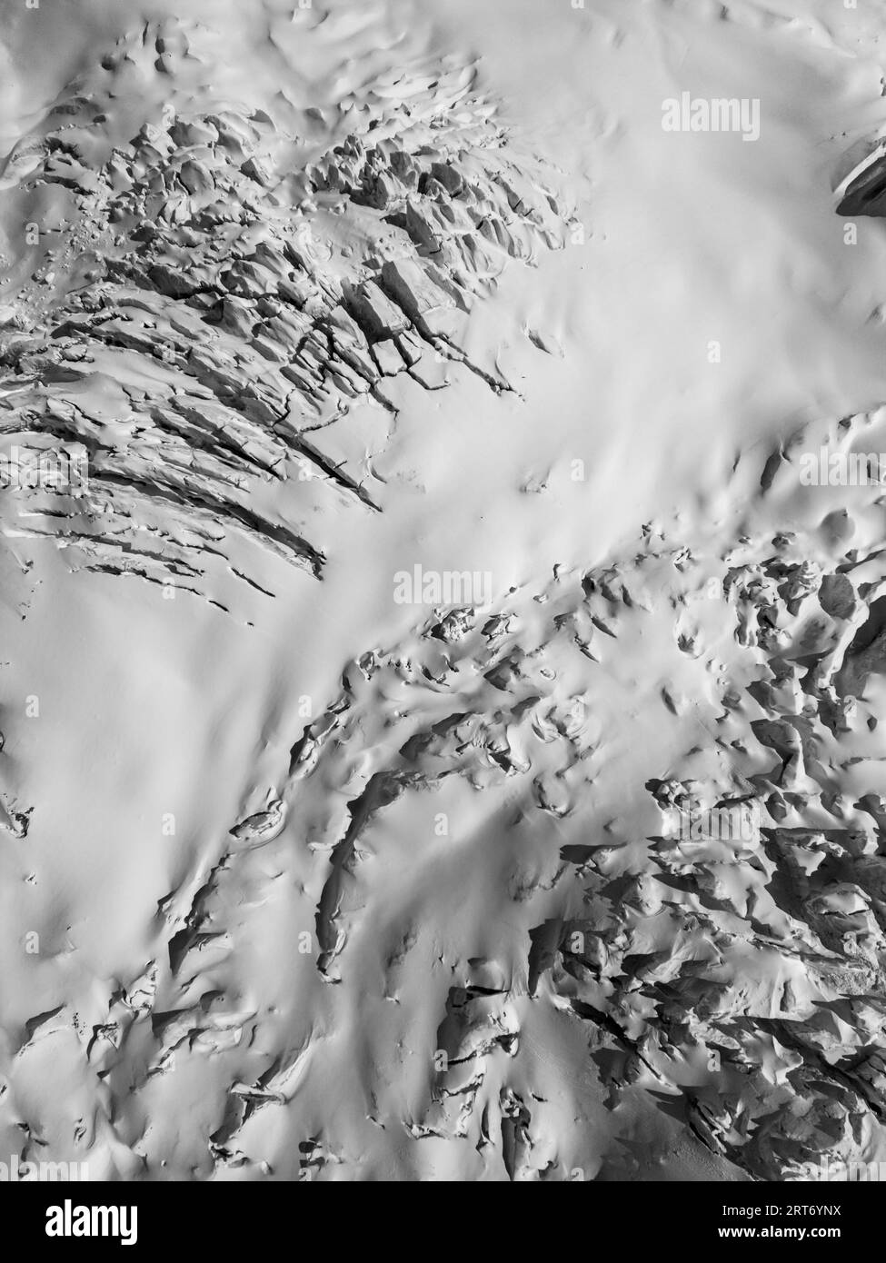 From above ice snow textured surface in wintertime mountains in Zermatt ...