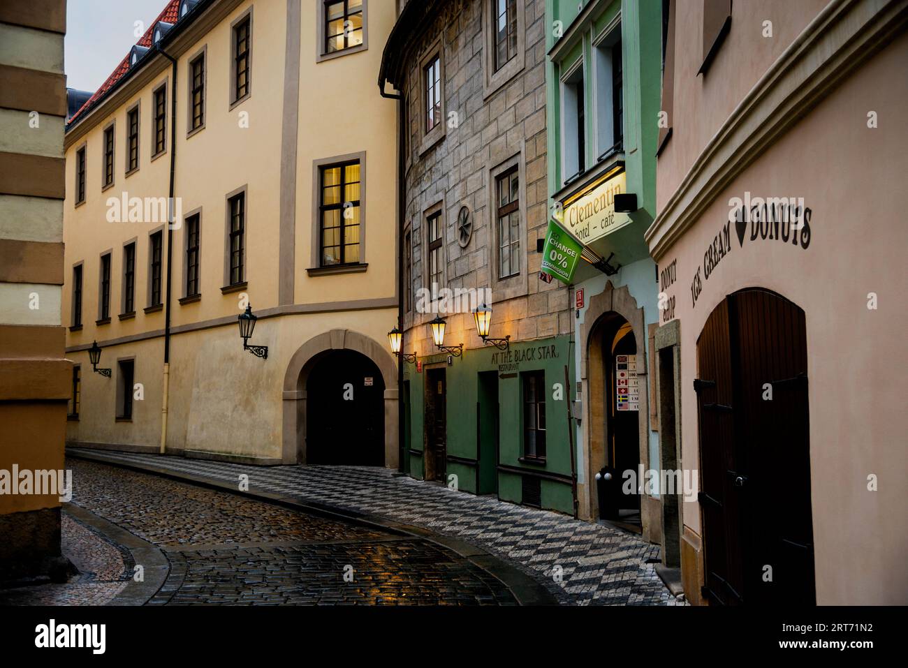 Curved cobblestone streets and black and white walkway in the ...
