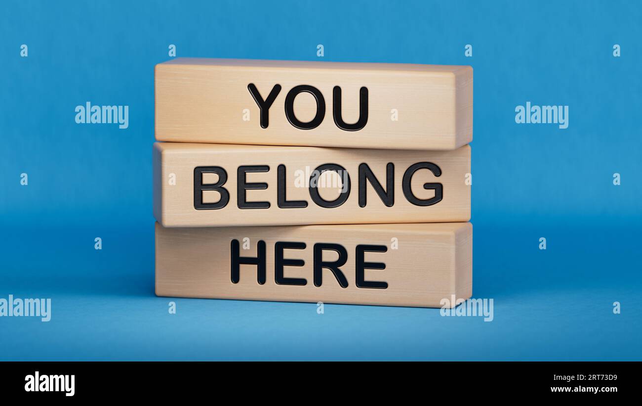 You belong here symbol. Wooden blocks with words You belong here ...