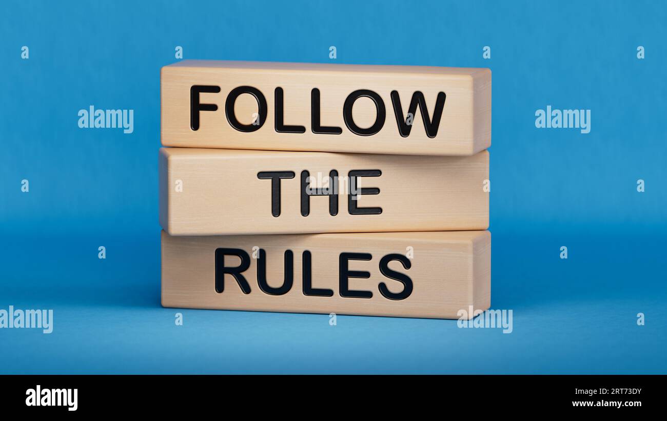 Follow the rules symbol. Concept words Follow the rules on wooden ...