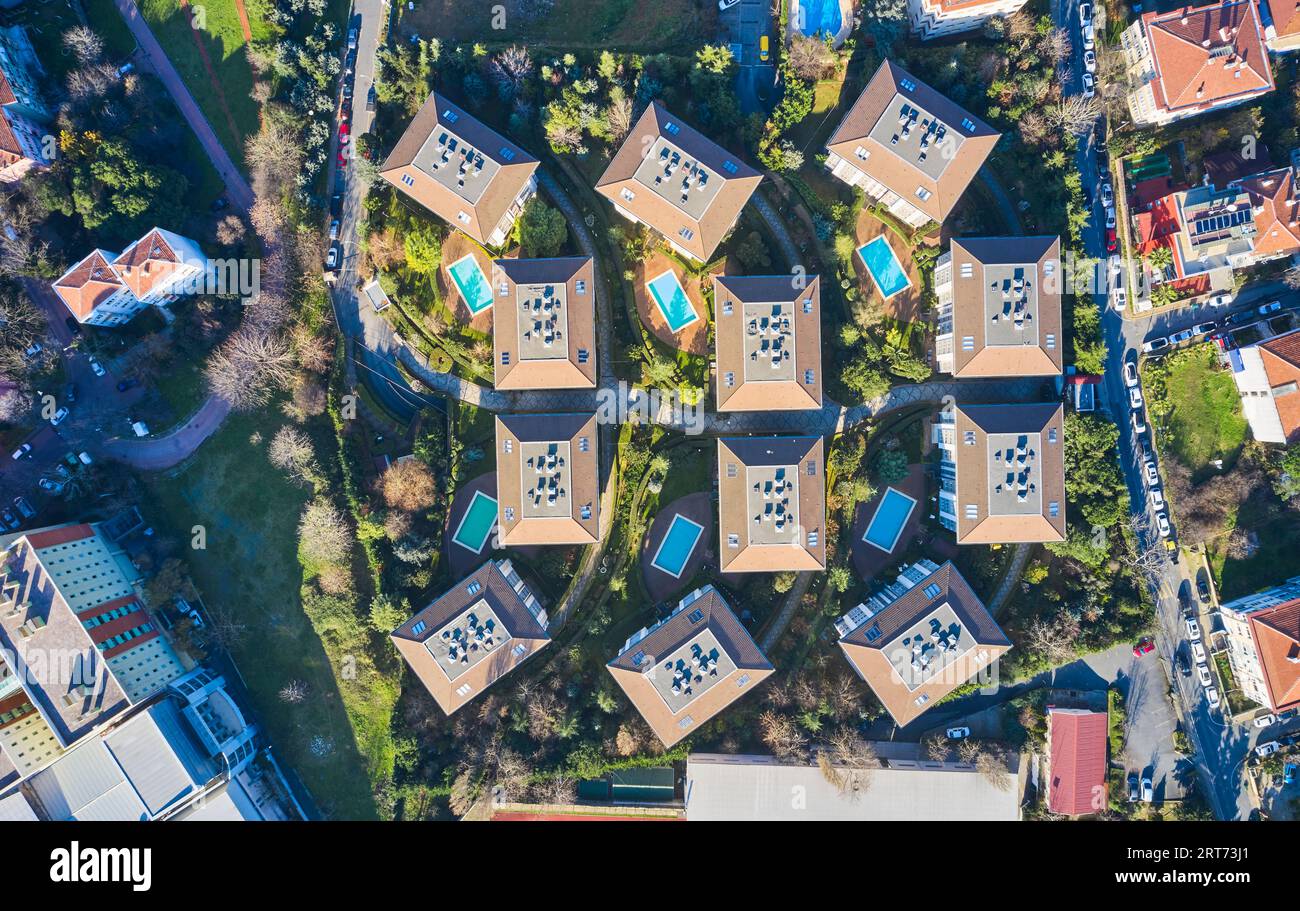 Drone shot of public housing. residential building with pools from the ...