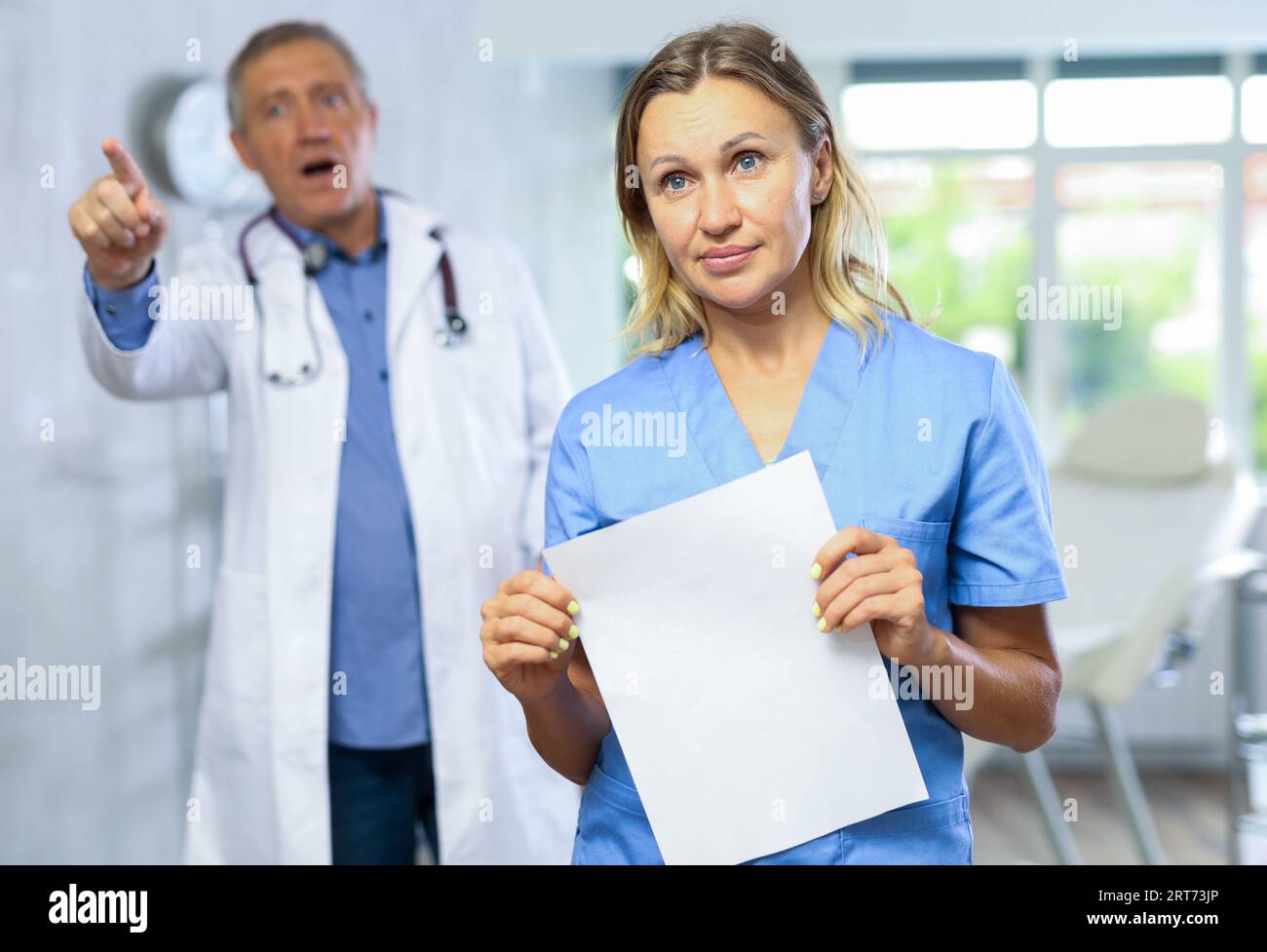 Angry doctor with paper hi-res stock photography and images - Alamy