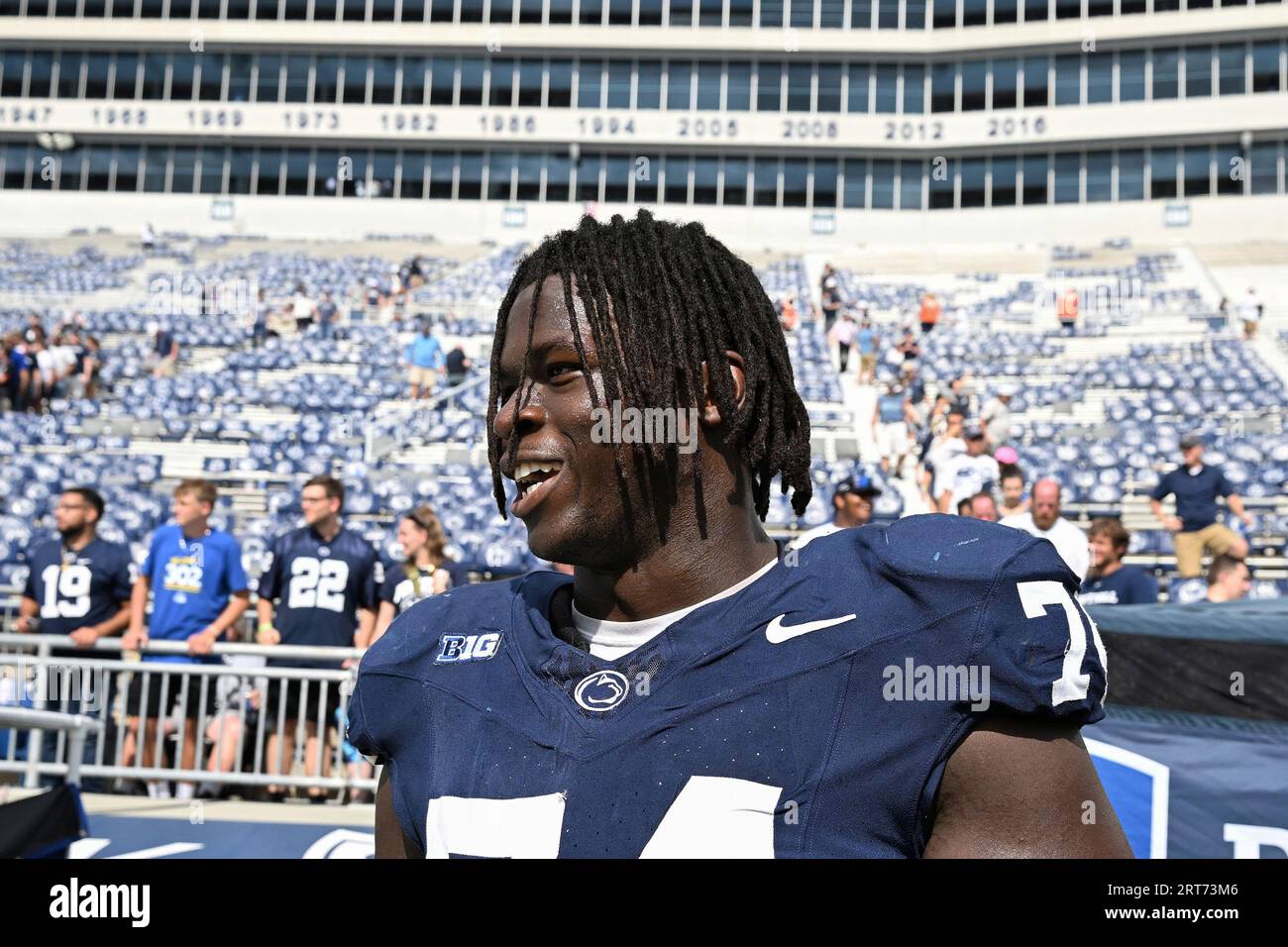 Penn State offensive lineman Olumuyiwa Fashanu (74) reacts following an ...