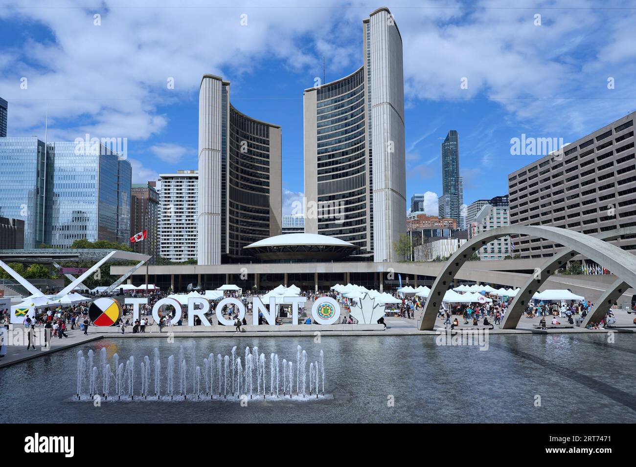 Vendors' booths at vegetarian food fair in Toronto City Hall Square ...