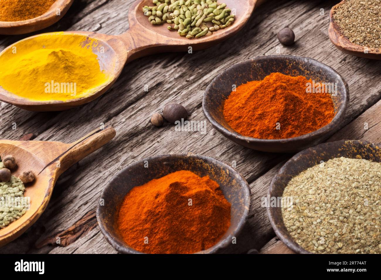 ancient spices on the wooden table Stock Photo - Alamy