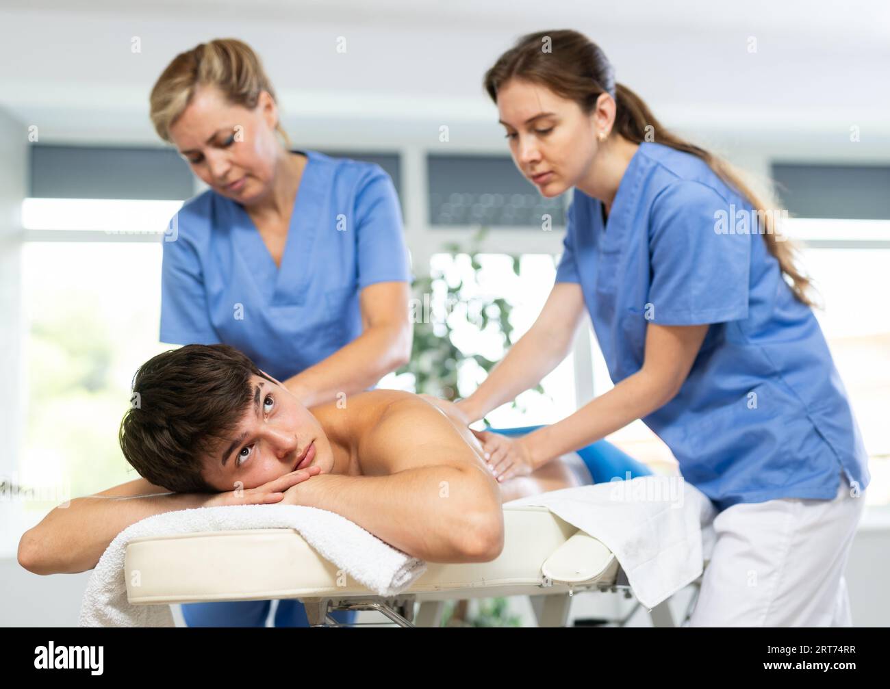 Four hand massage hi-res stock photography and images - Alamy