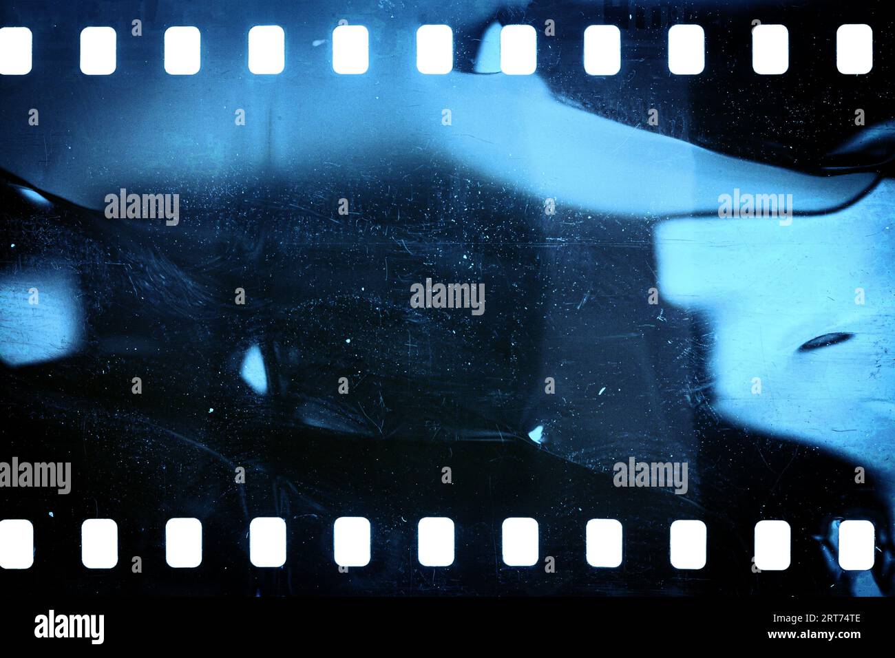 Dusty and grungy 35mm film texture or surface. Perforated scratched ...