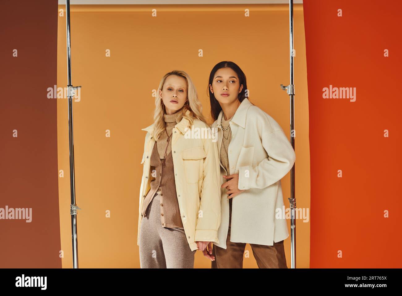 autumn fashion, pretty multicultural models in warm season attire ...