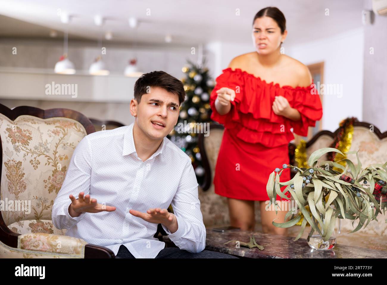 Couple sad christmas interior hi-res stock photography and images - Alamy