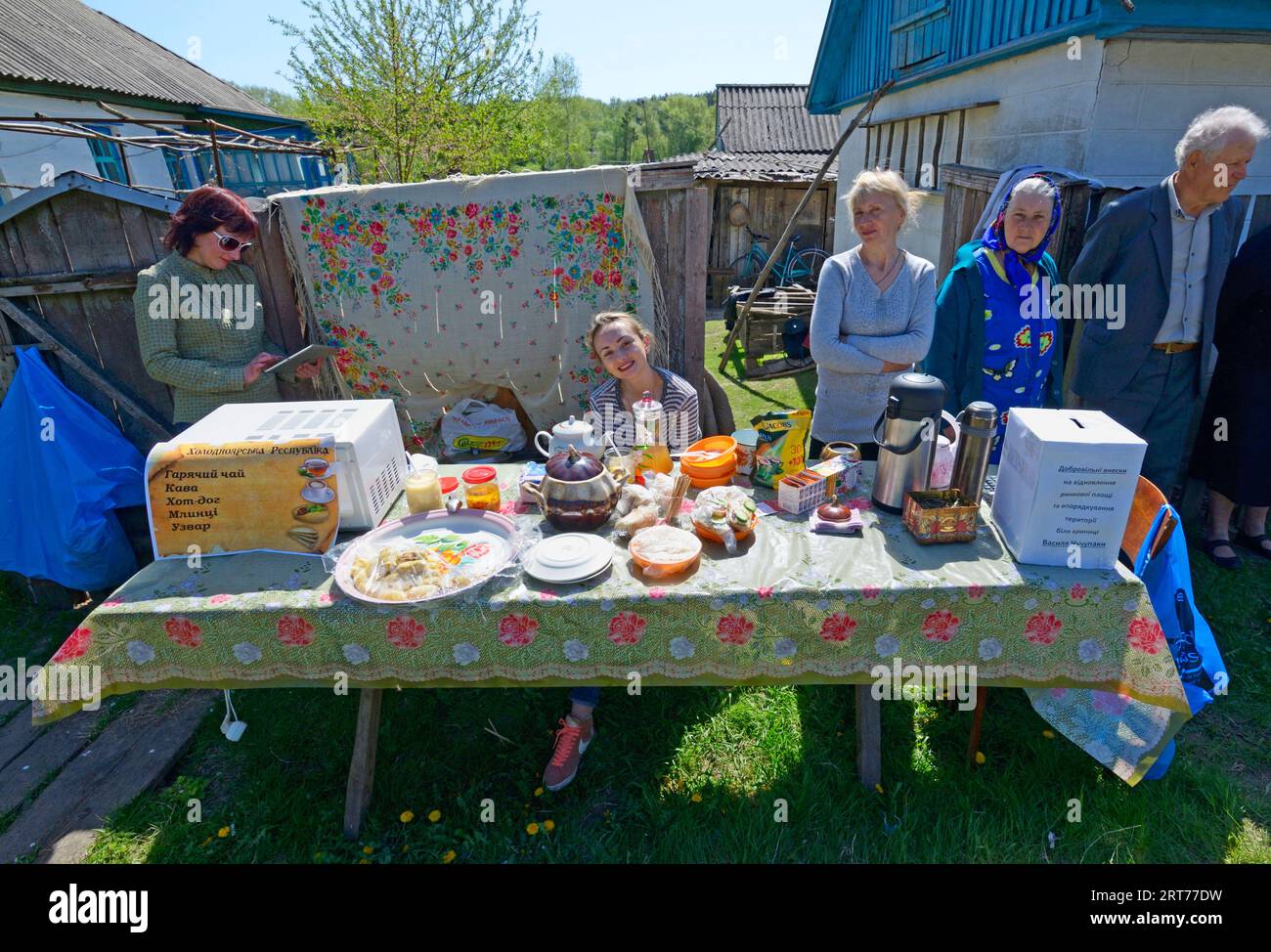 Woman street seller selling traditional Ukrainian meals and snacks ...