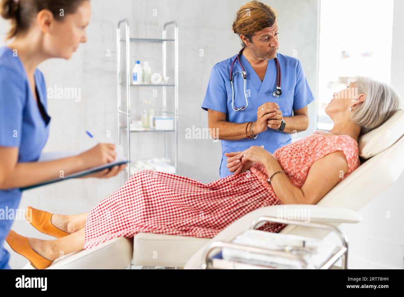Sick female patient visiting doctor Stock Photo - Alamy