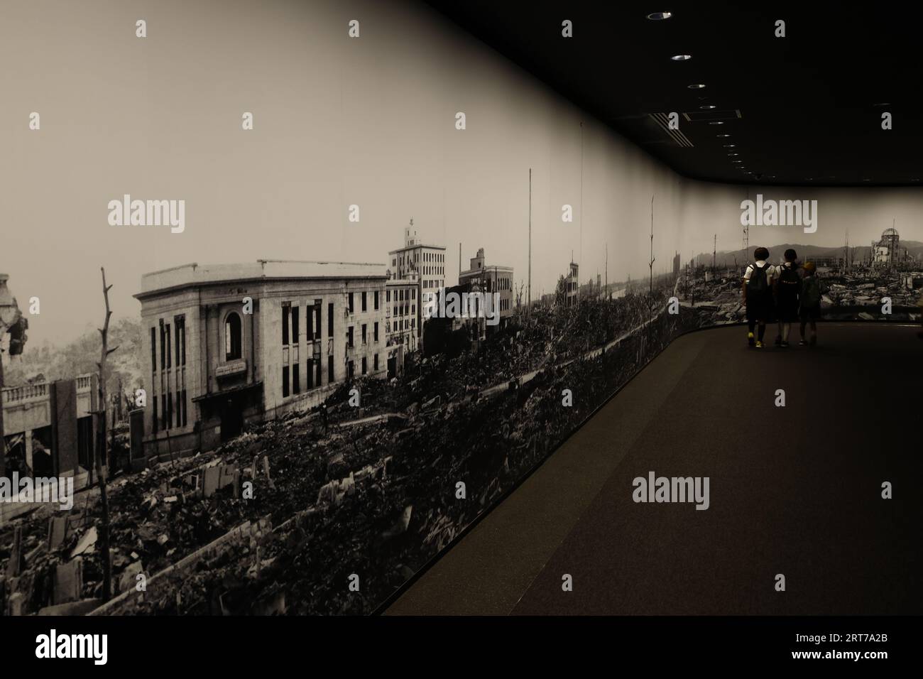 Photographs depicting the aftermath of the bombing, scale models of the ...