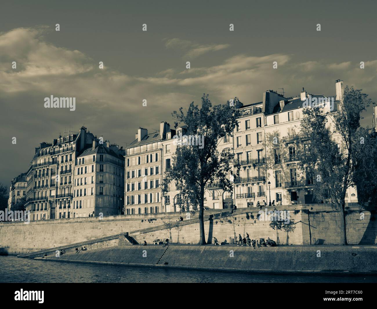 Black and White, Evening Light, Apartments and people relaxing on the River Bank, River Seine ...