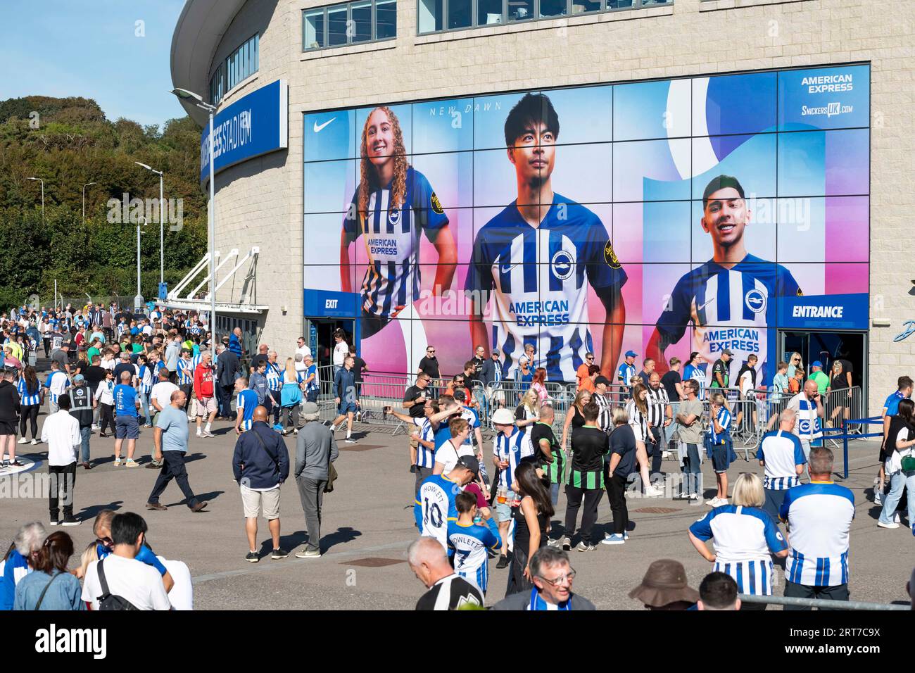 Football fans arriving at the Brighton and Hove Albion Football Club's ...