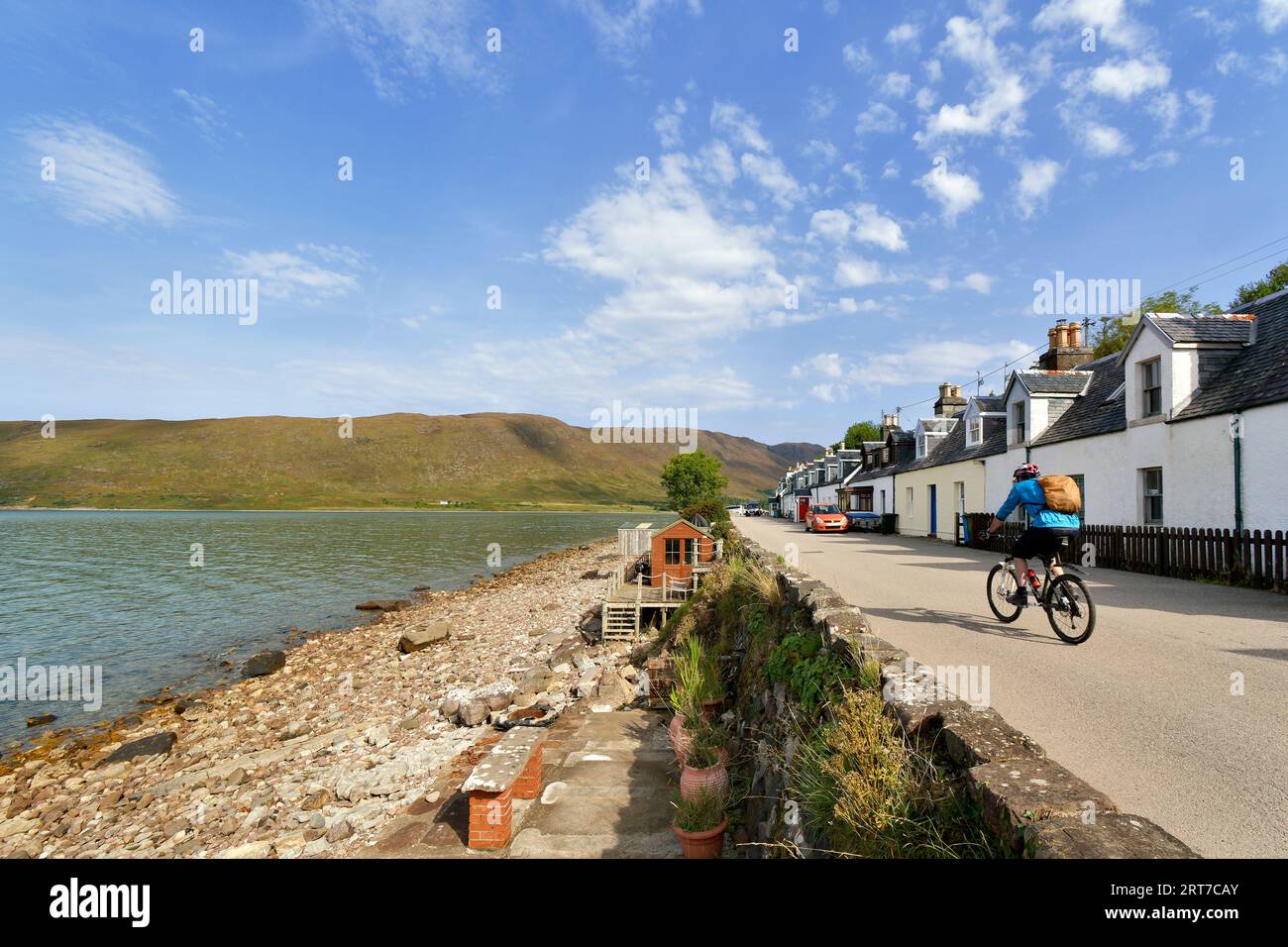 Applecross Bealach na Ba a cyclist and improvised beach huts in Shore ...
