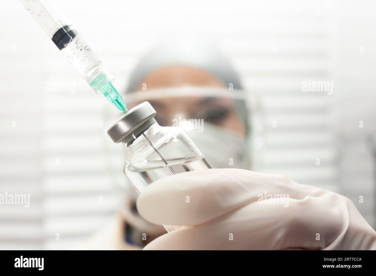 Nurse prepares syringe vaccination hi-res stock photography and images ...