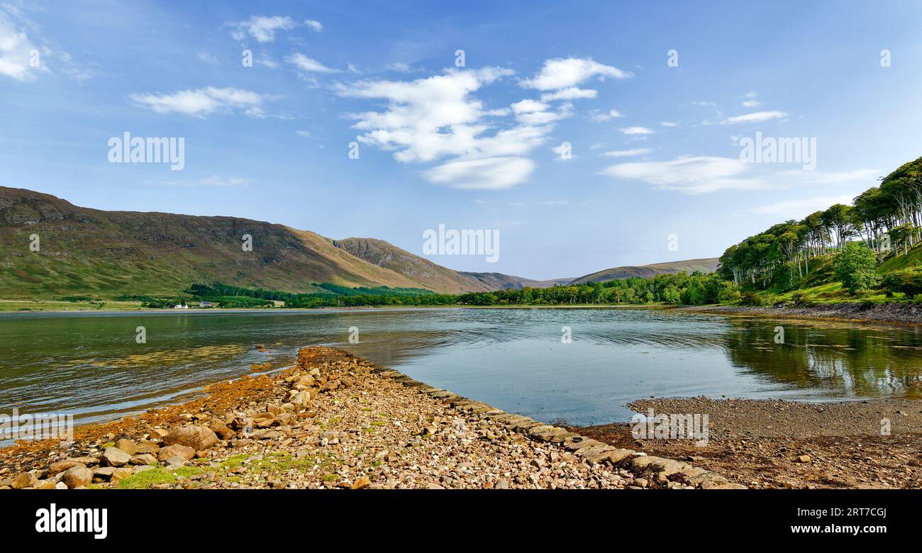 Applecross Bealach na Ba Applecross Bay blue sky over the slipway and ...