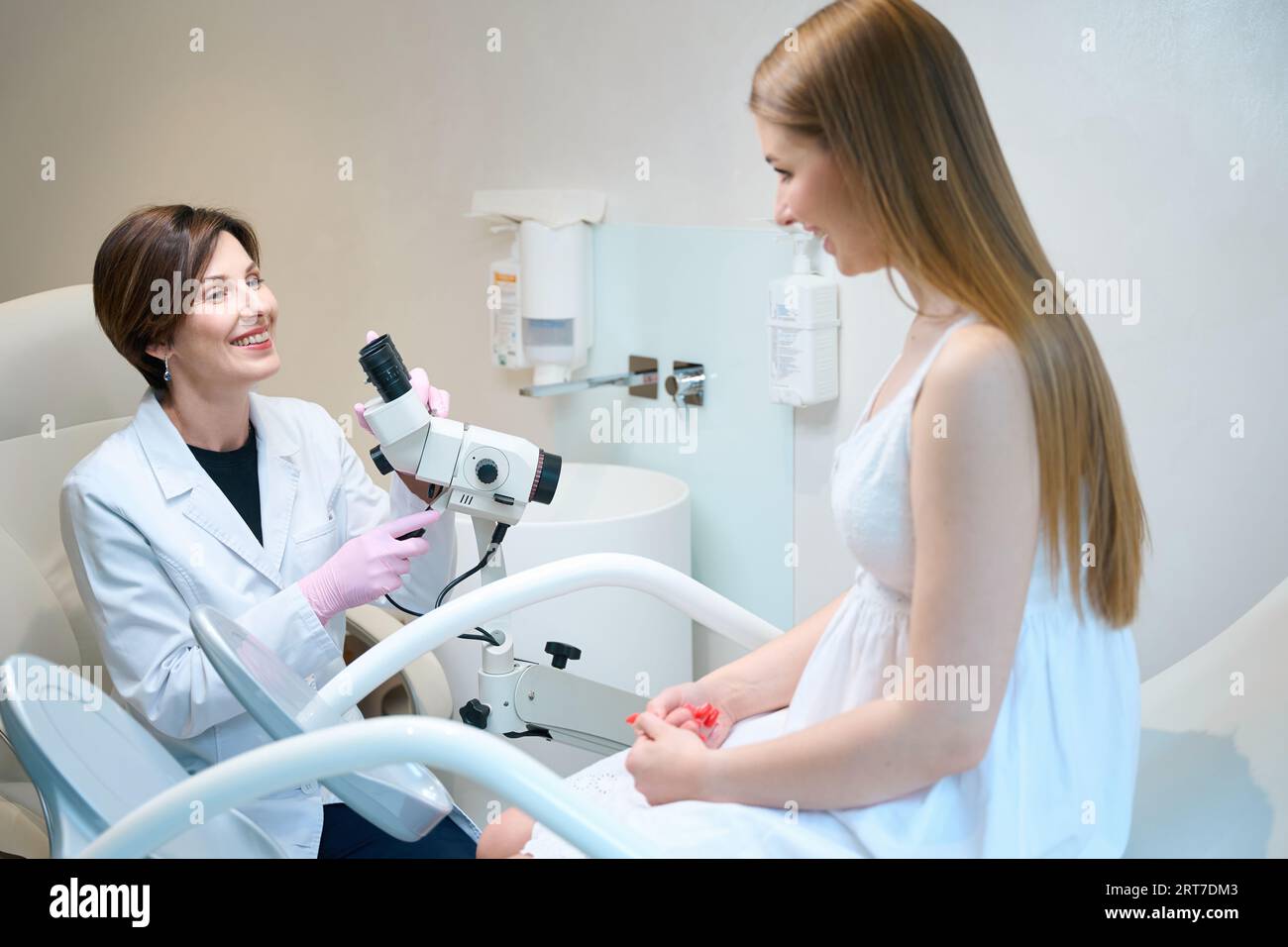 Gynecologist uses a gynecological microscope in her work Stock Photo ...