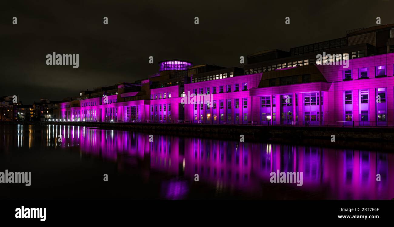 Scottish Goveernment building Victoria Quay lit up pink at night for ...