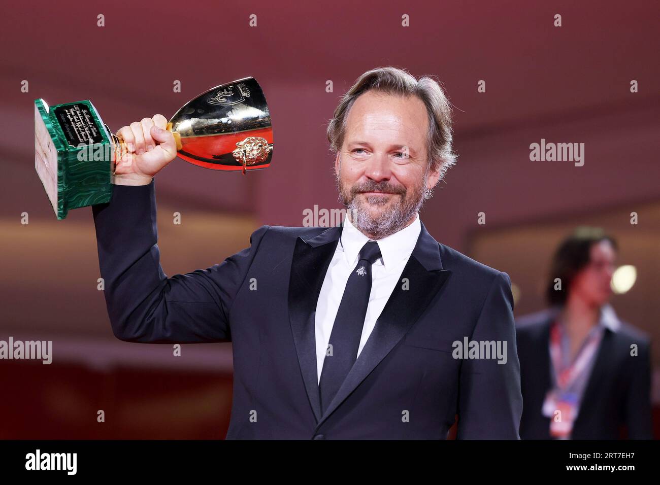 VENICE, ITALY - Sep 09: Peter Sarsgaard poses with the Best Actor Award ...