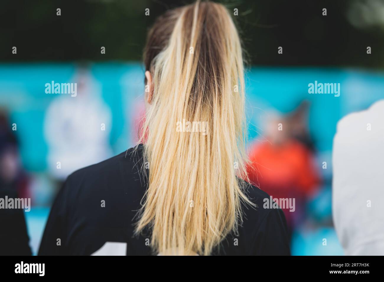 Female football street match outdoor game on an artificial astroturf ...