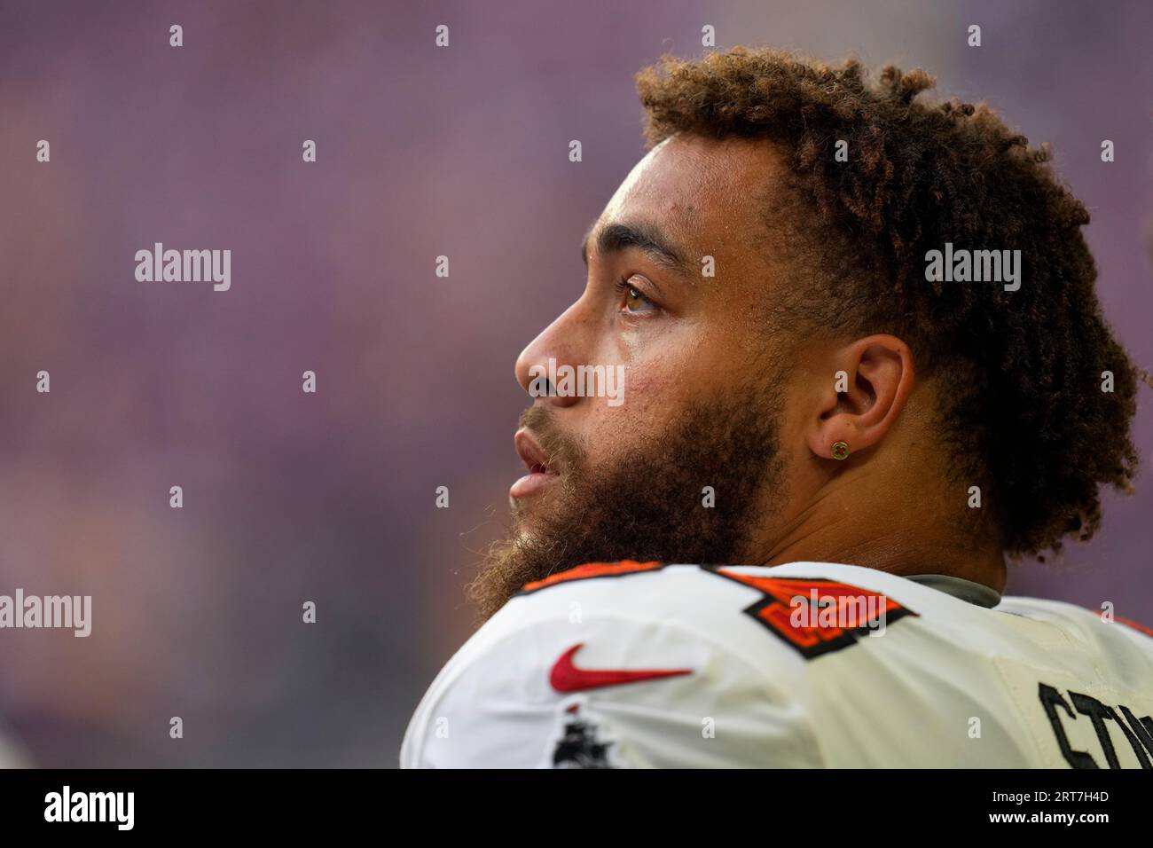 Tampa Bay Buccaneers guard Aaron Stinnie stands on the field before an ...