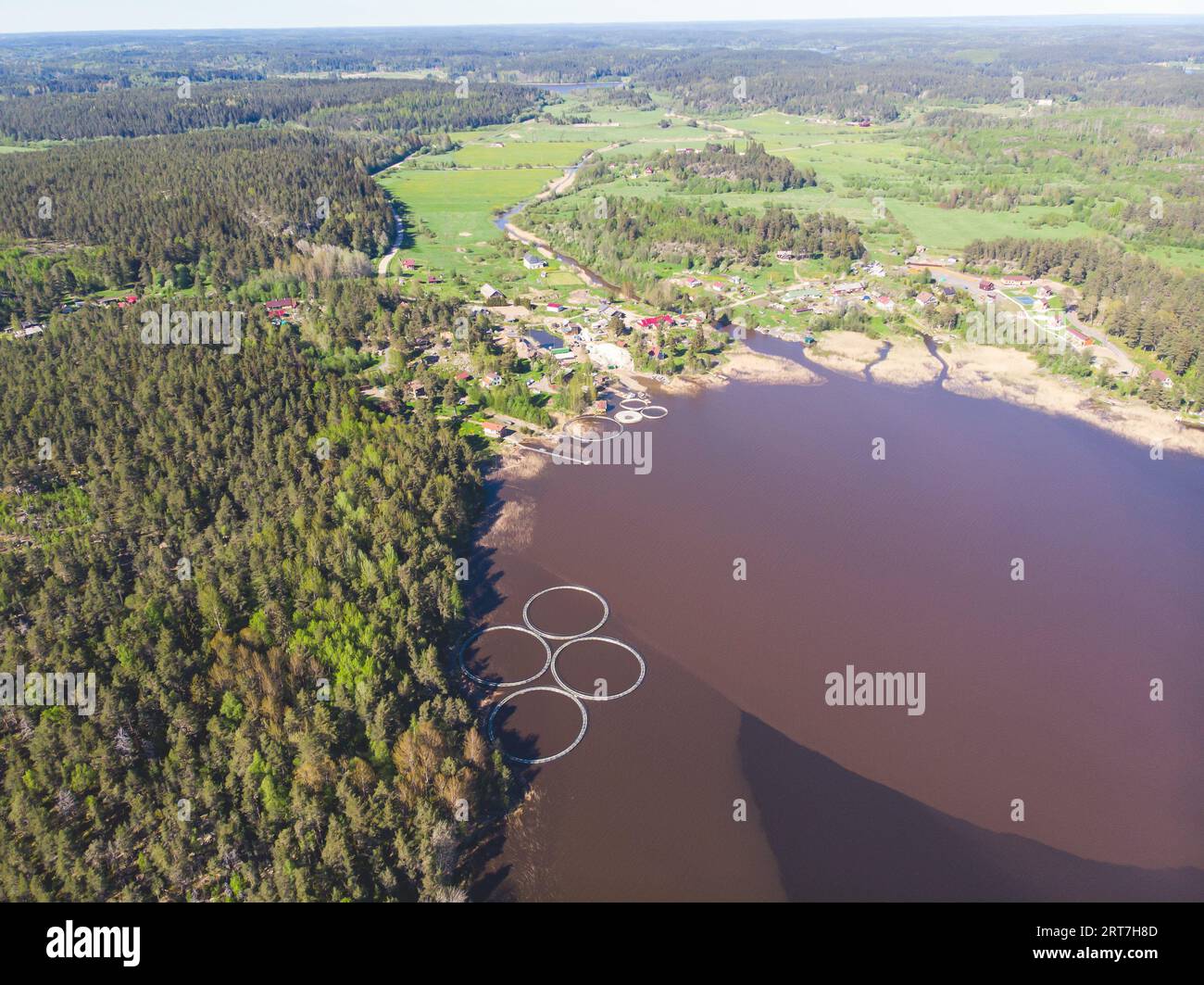 Aerial drone view of circle sea fish farm cages and round fishing nets ...