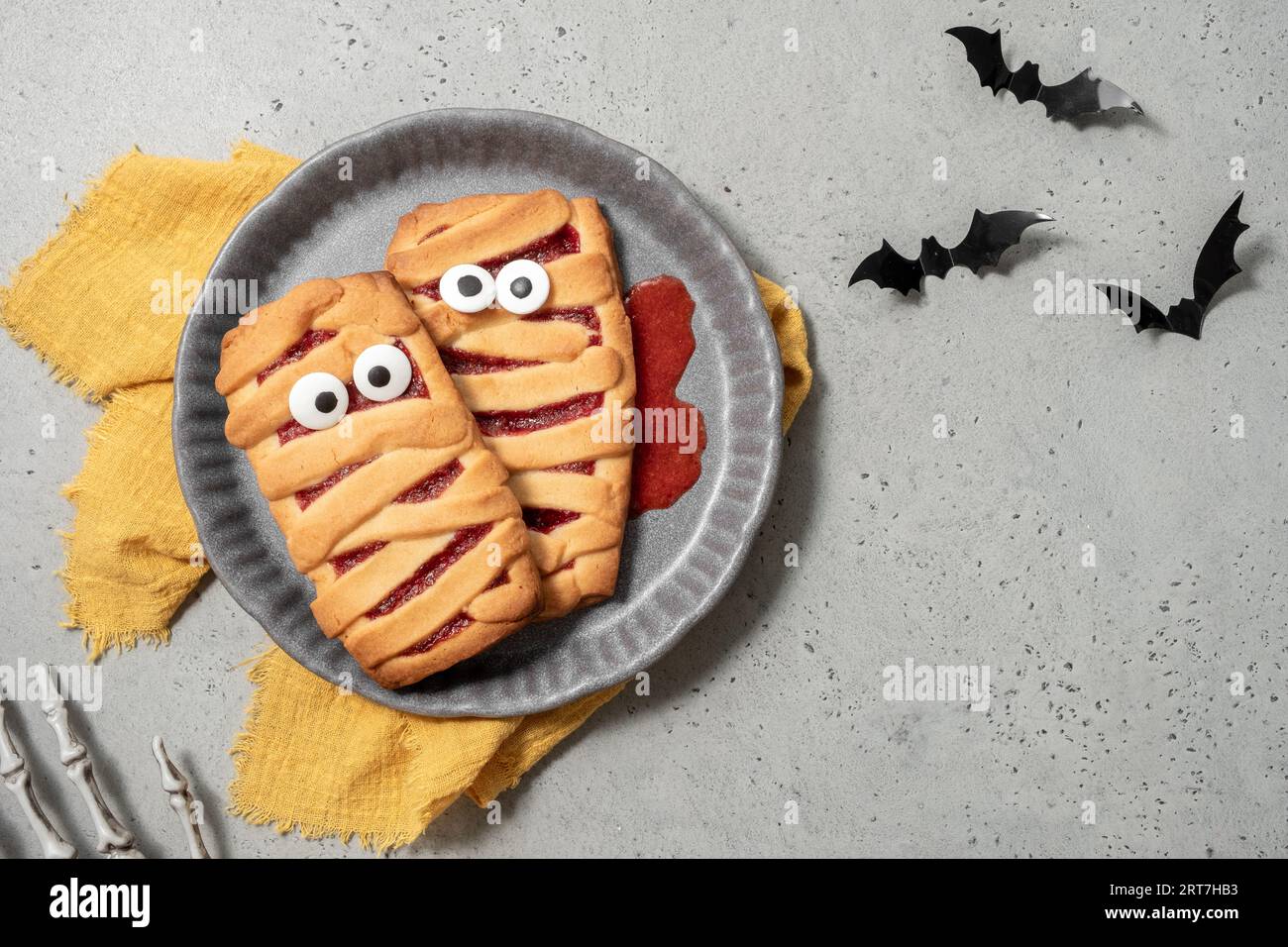 Halloween shortbread cookies with strawberry jam. Cookie is a mummy ...