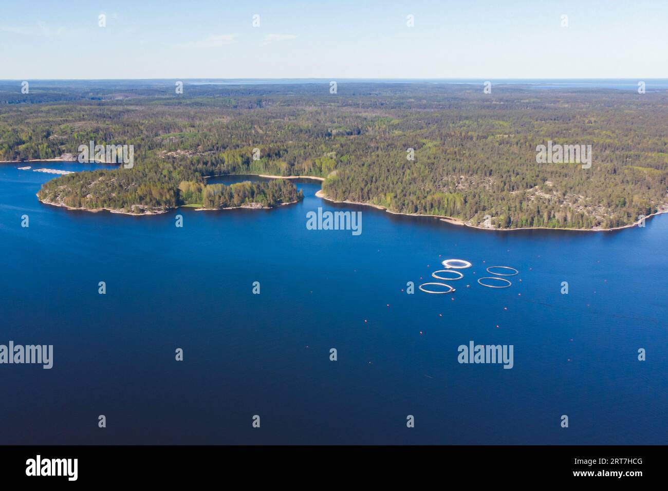 Aerial drone view of circle sea fish farm cages and round fishing nets ...