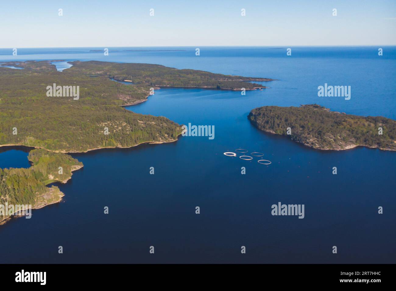 Aerial drone view of circle sea fish farm cages and round fishing nets ...