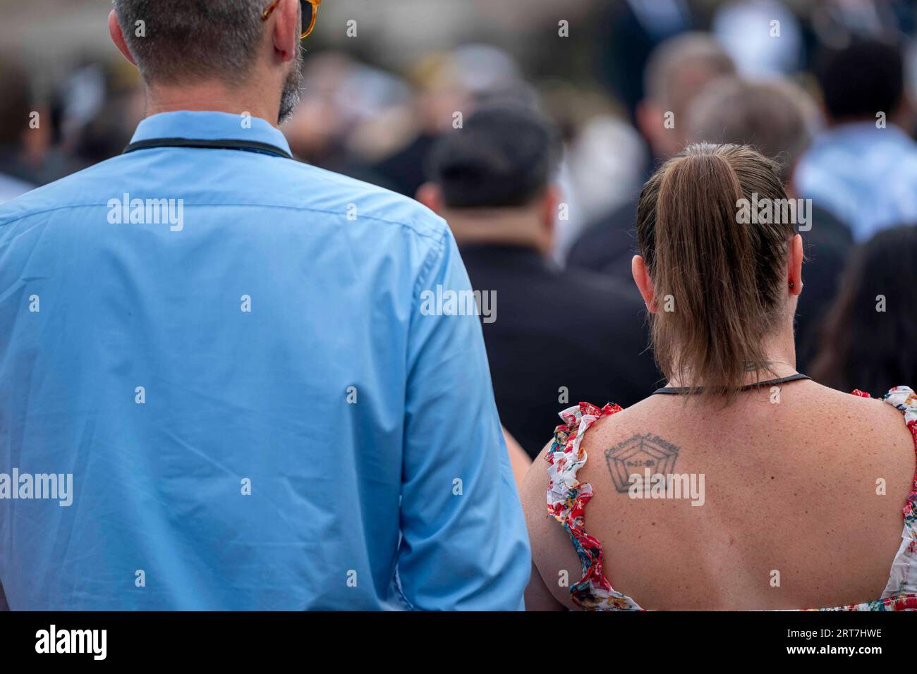 Arlington, United States. 11th Sep, 2023. A women with a tattoo of the ...