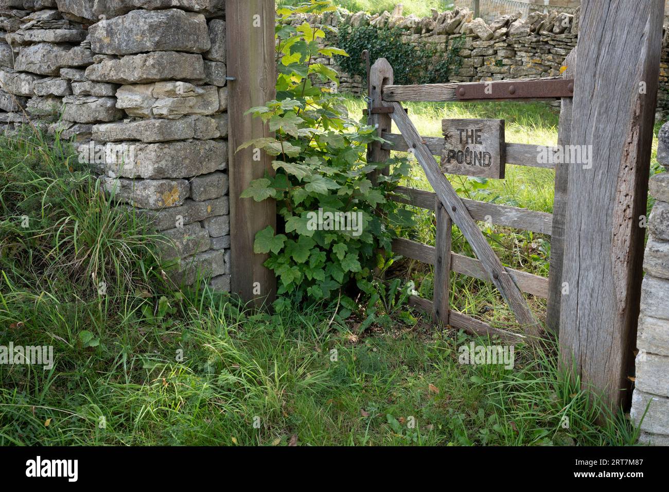 A detail of the gate leading into a village sheep pound in the Cotwolds ...