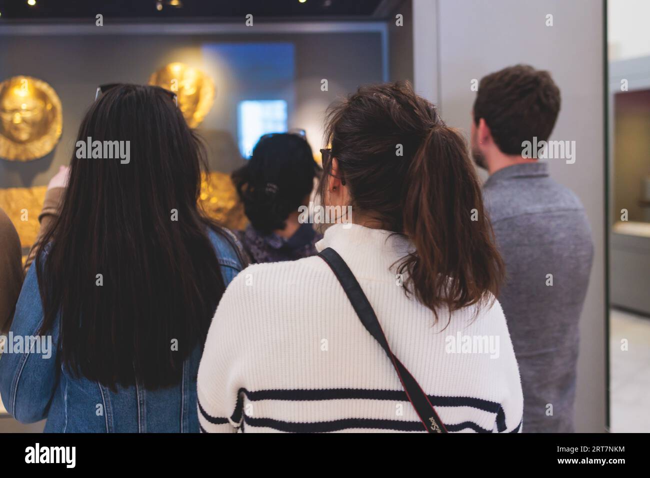 Group of students on excursion tour visit gallery museum with tour ...