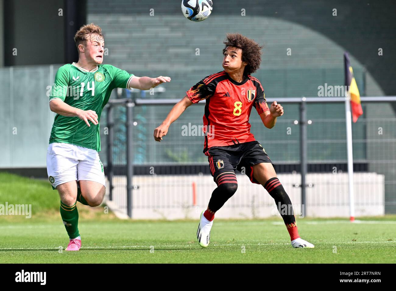 Kaylem Harnett (14) of Ireland pictured fighting for the ball with Zaïd ...