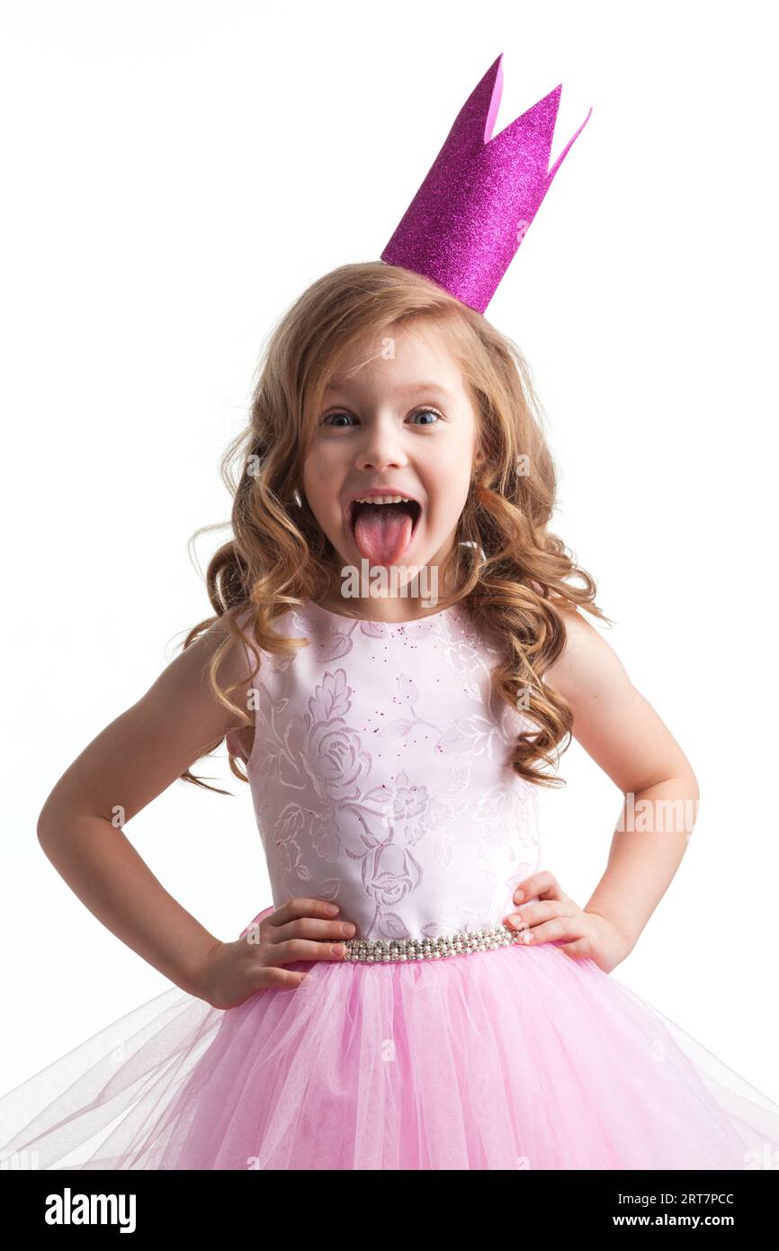 Little princess girl in pink crown and beautiful dress on white ...