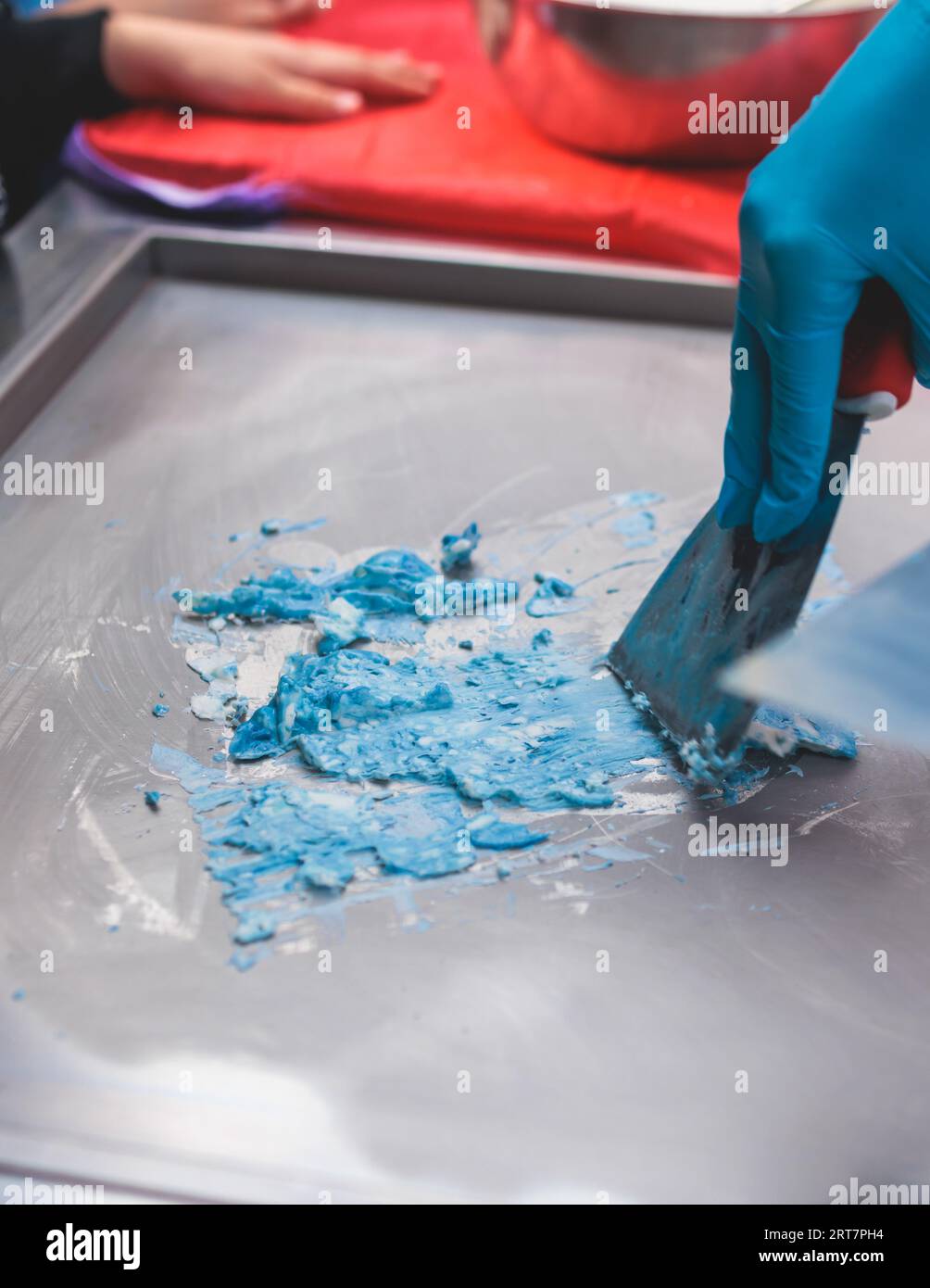 Rolled thai ice cream preparation, process of cooking coloured fried ...