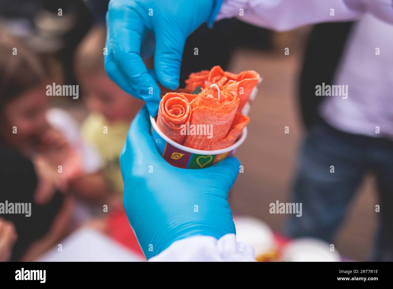 Rolled thai ice cream preparation, process of cooking coloured fried ...