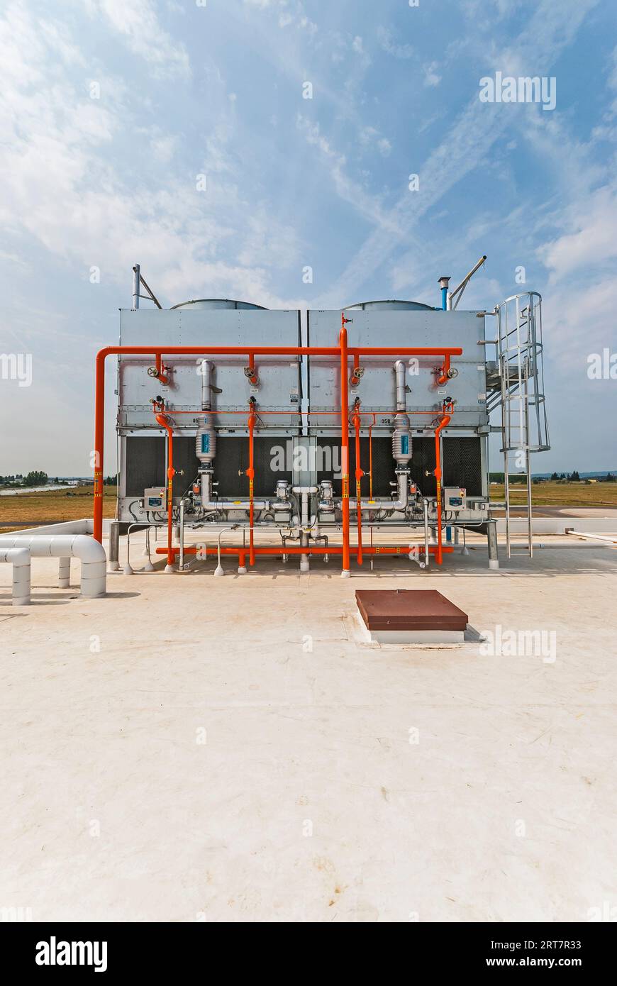 Commercial refrigeration condenser on roof of a cold-storage facility ...