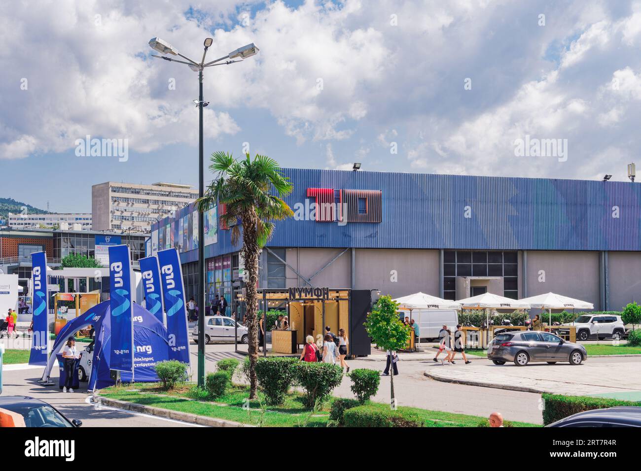 Thessaloniki, Greece Visitors outside pavilions of the 87th TIF ...