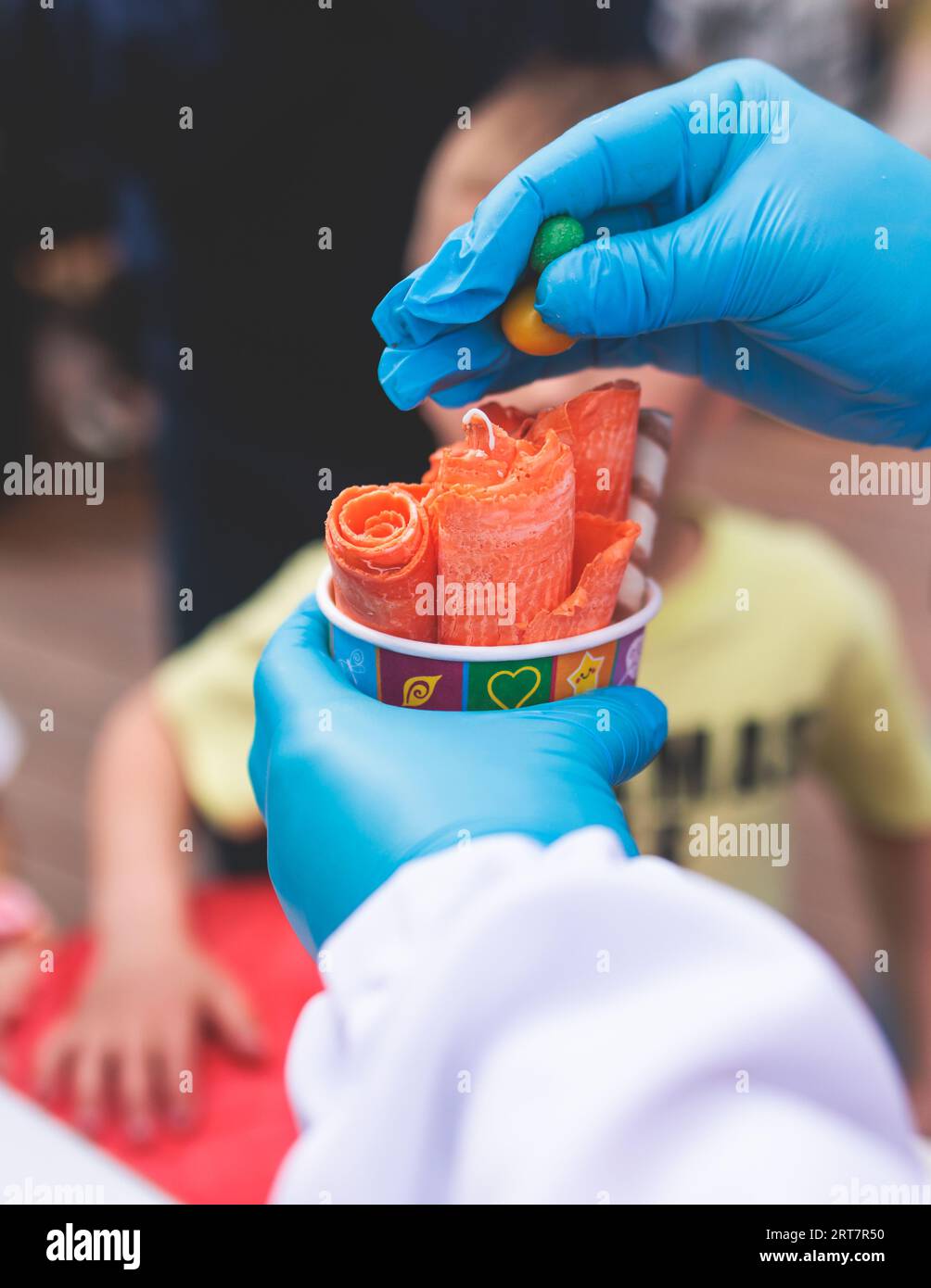 Rolled thai ice cream preparation, process of cooking coloured fried ...