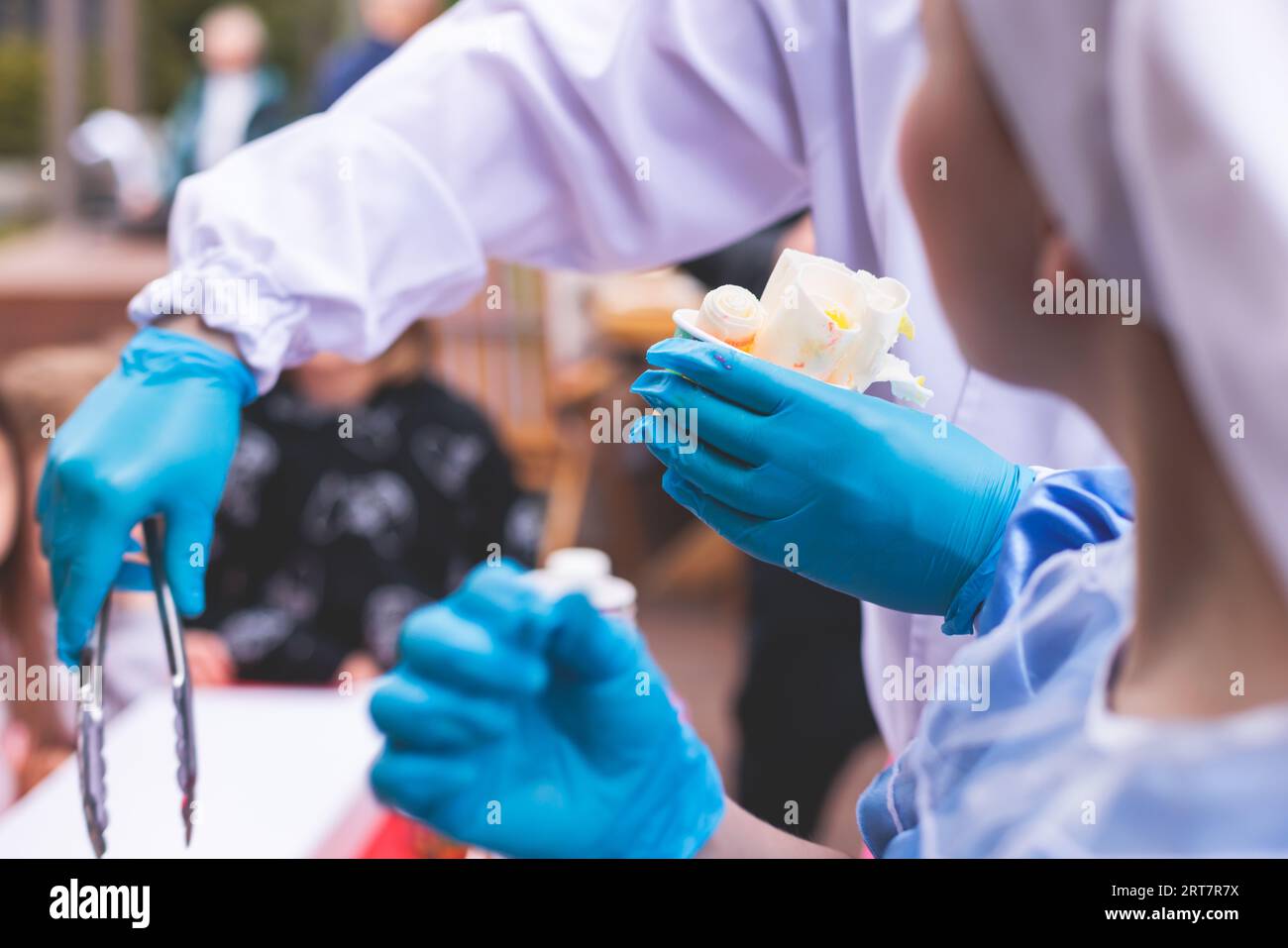 Rolled thai ice cream preparation, process of cooking coloured fried ...