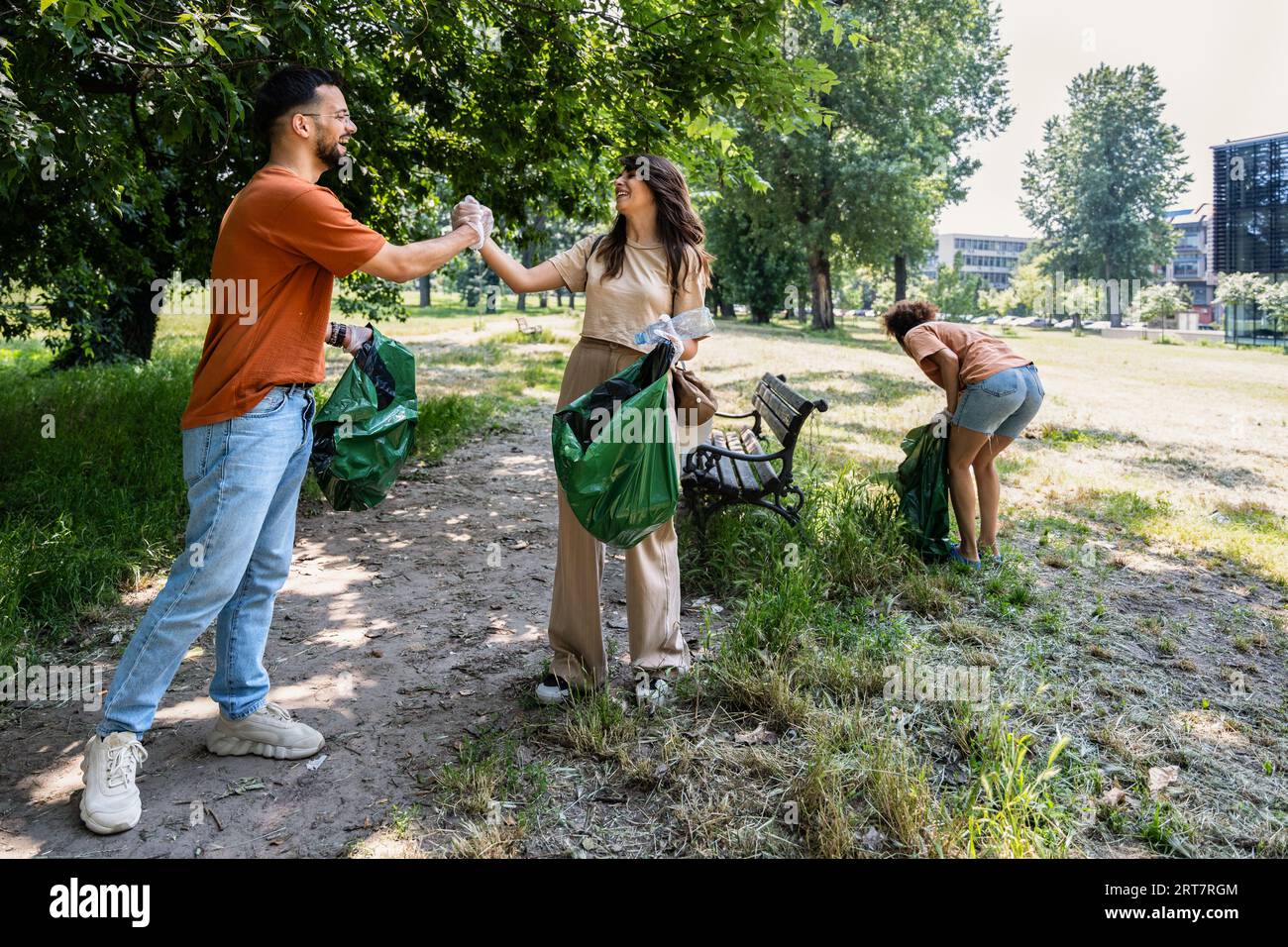 Group of young conscious activists collect and clean up trash from the ...