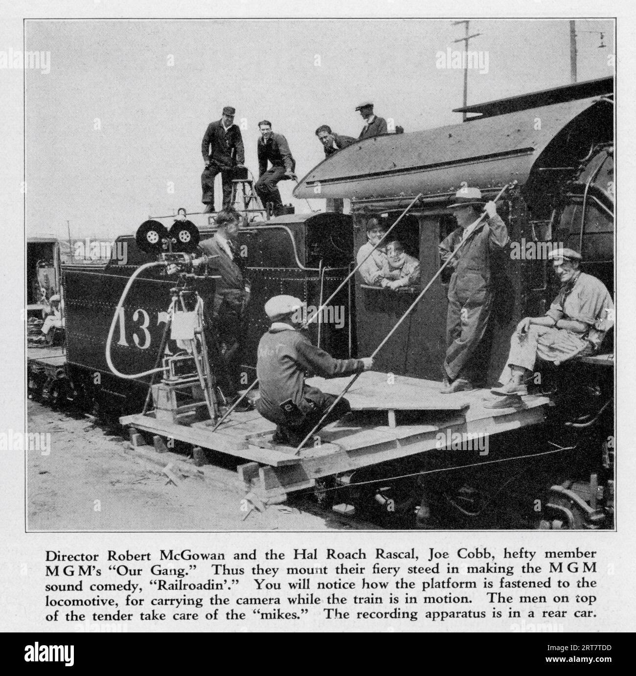 Director ROBERT McGOWAN and the Hal Roach Rascal JOE COBB in April 1929 on set location candid ...